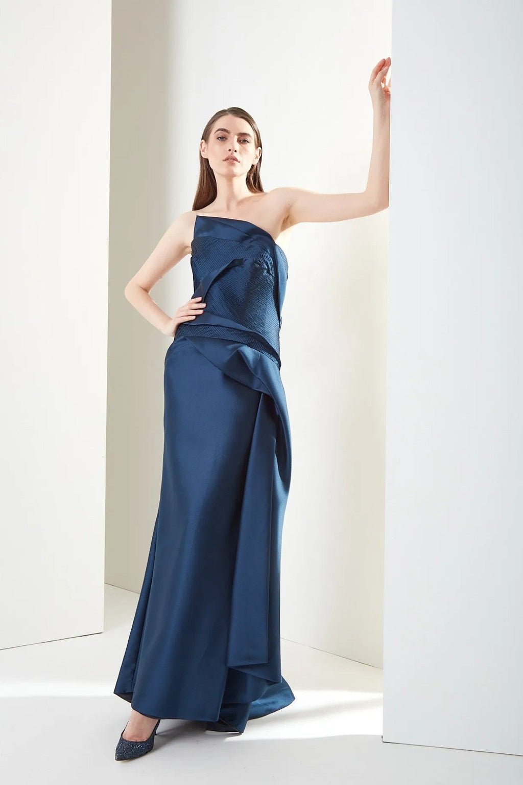 Strapless Italian mikado gown with architectural hand- draped bodice ...
