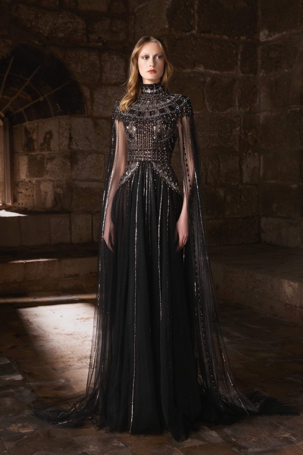 Tulle gown with embroidered architectural bodice, pleated skirt, and d ...
